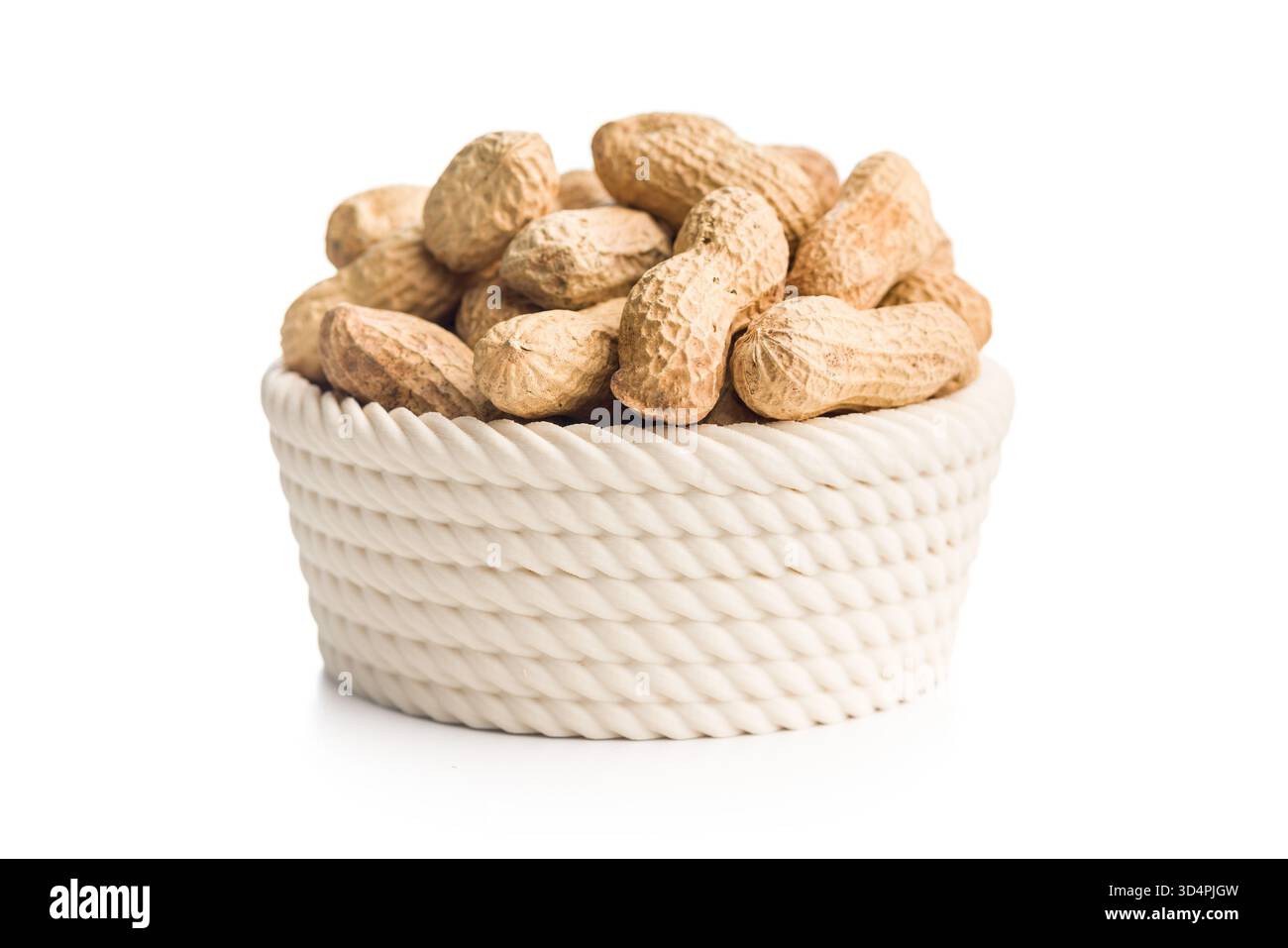 Peanuts in shell. Groundnuts in bowl isolated on a white background ...