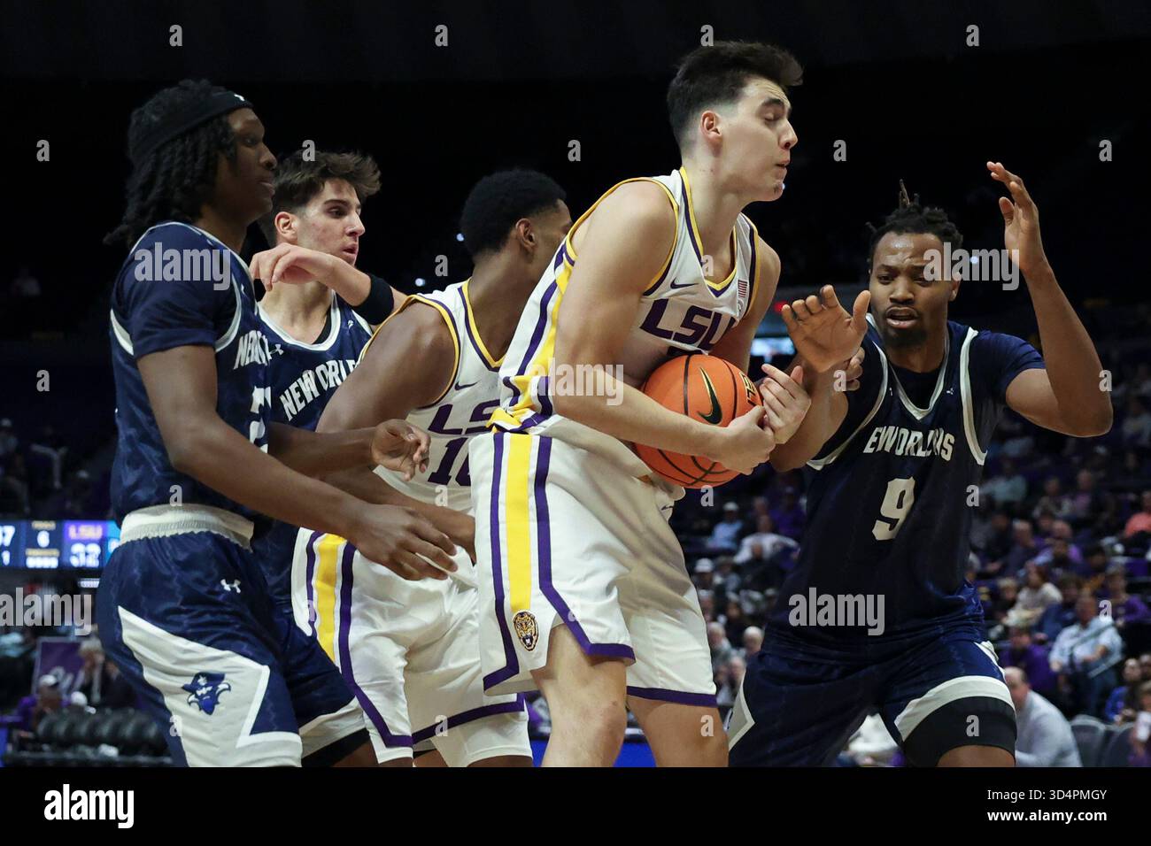 LSU Tigers guard Max MacKinnon (3) pulls down a defensive rebound ...