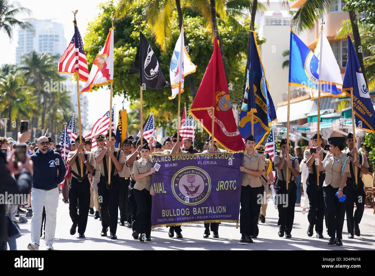 Members of the G. Holmes Braddock High School JROTC walk along Ocean ...