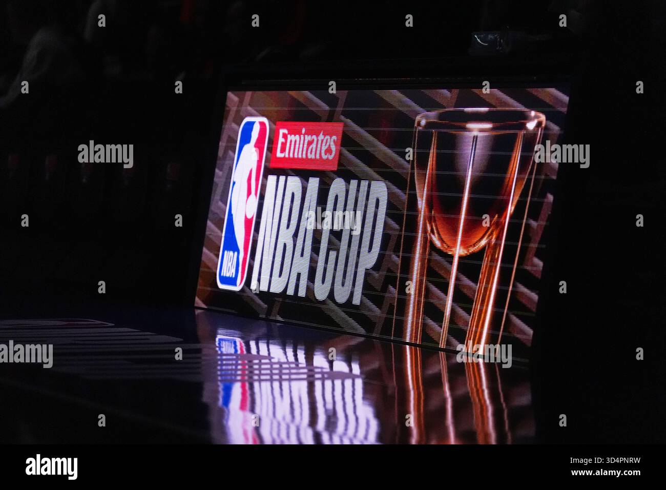 Sign courtside in the first half of an NBA Cup basketball game Friday ...