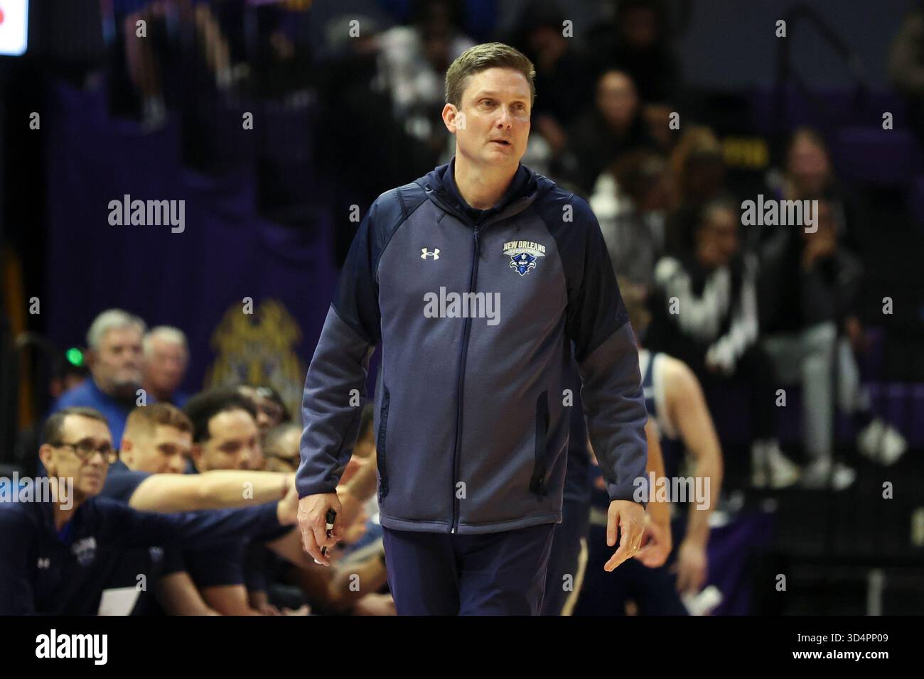 UNO Privateers head coach Stacy Hollowell walk the sidelines during the second half of a NCAA ...
