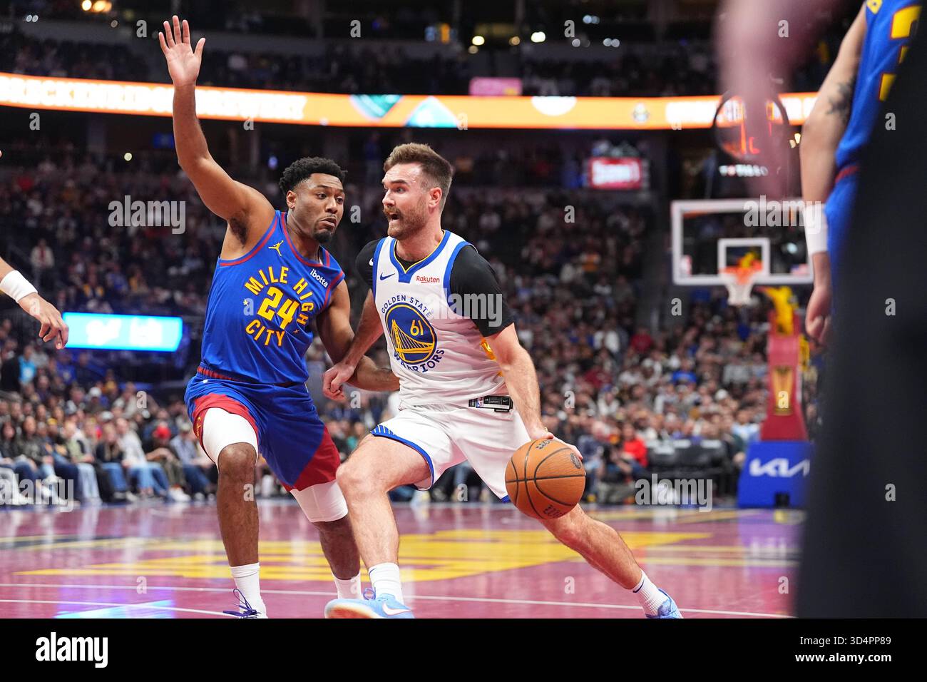 Golden State Warriors guard Pat Spencer (61) and Denver Nuggets guard ...