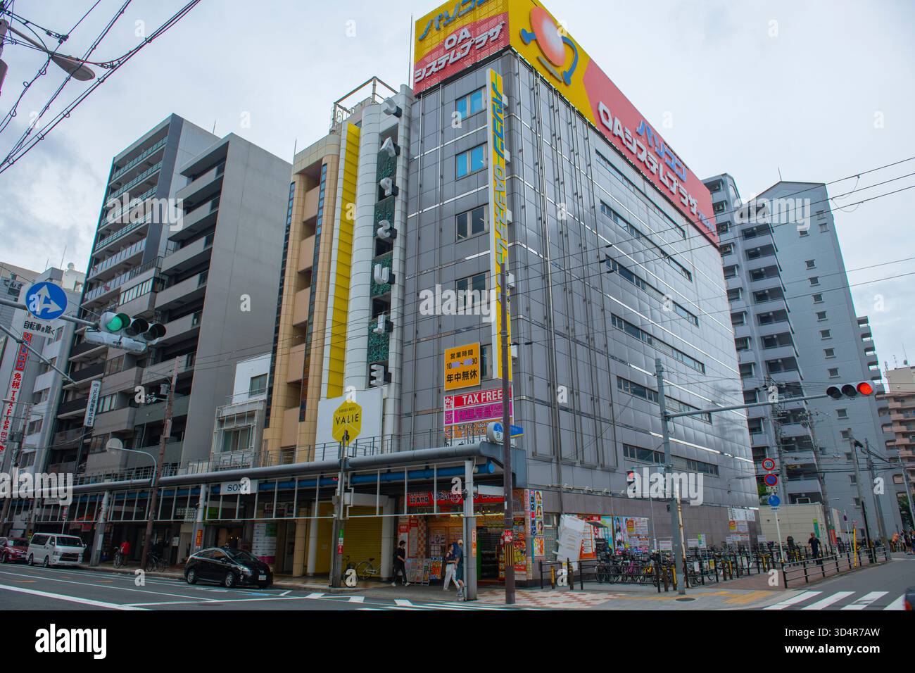 Modern commercial buildings on Sakai suji Avenue at Nipponbashi 5 in ...