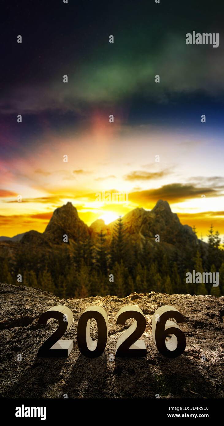 Number 2026 on a rocky mountain cliff with a dramatic dawn or sunset ...