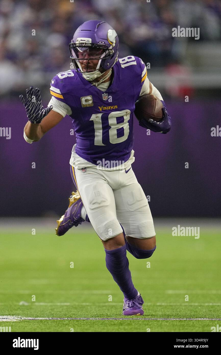 Minnesota Vikings wide receiver Justin Jefferson (18) runs with the ...