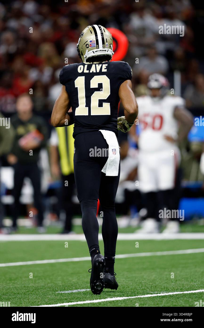 New Orleans Saints wide receiver Chris Olave (12) wears an ...