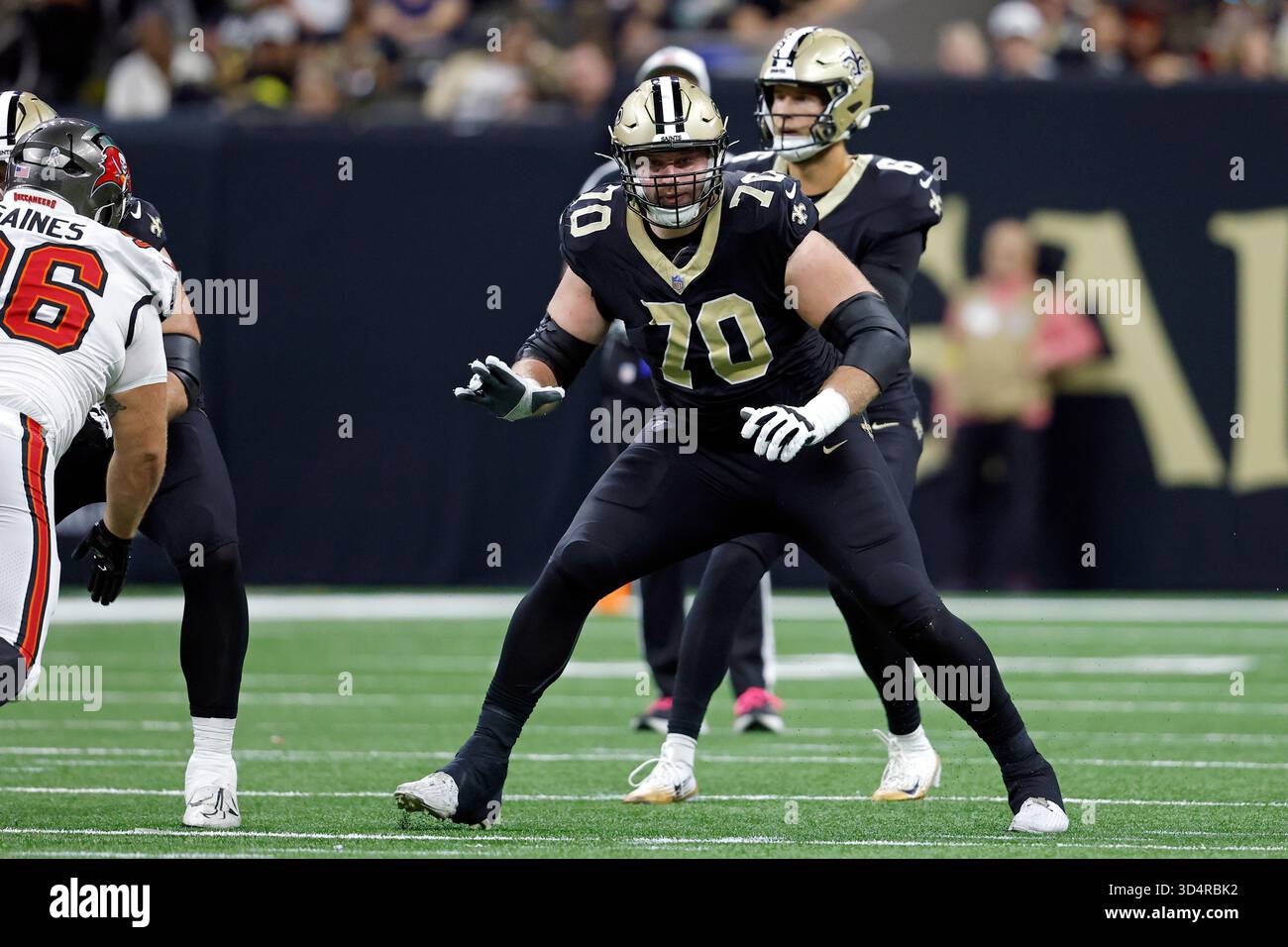 New Orleans Saints offensive tackle Trevor Penning (70) defends during ...