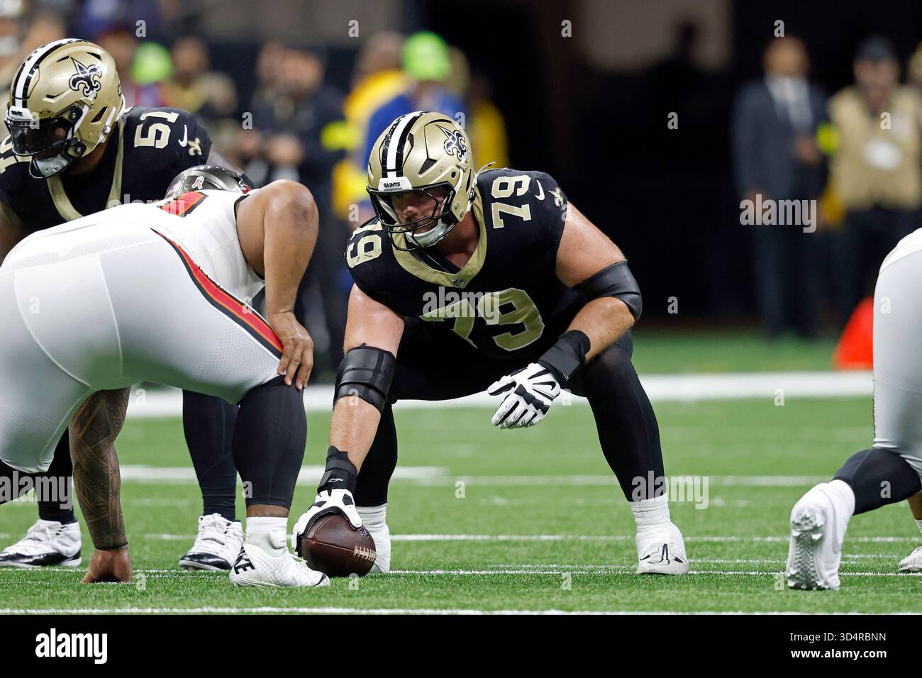 New Orleans Saints center Luke Fortner (79) waits to snap the ball ...