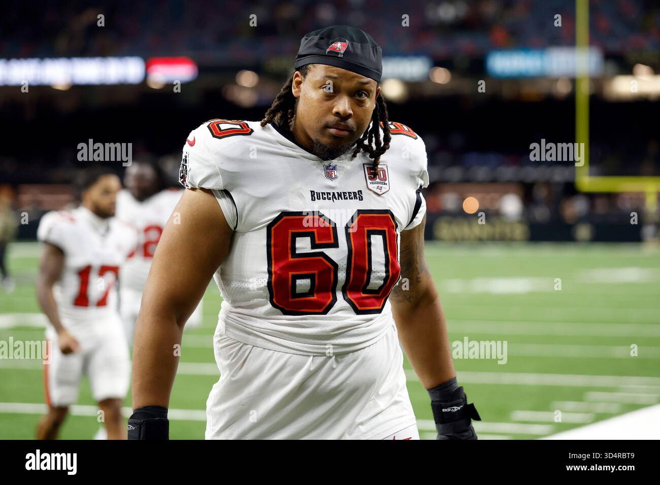 Tampa Bay Buccaneers guard Mike Jordan (60) walks off the field after ...