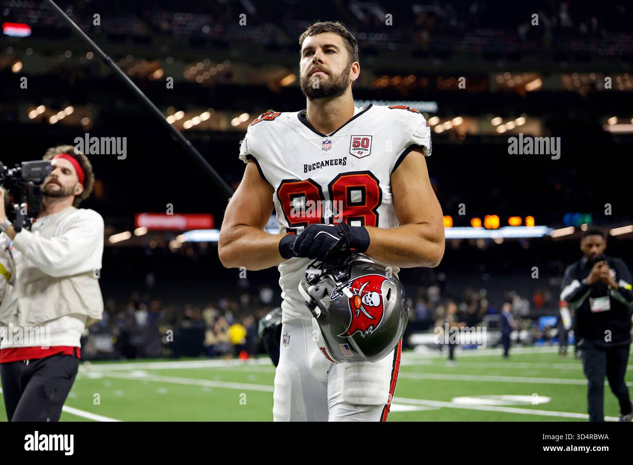 Tampa Bay Buccaneers linebacker Anthony Nelson (98) walks off the field ...