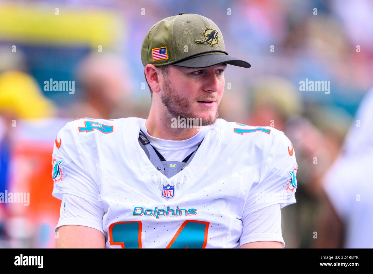 Miami Dolphins quarterback Quinn Ewers (14) stands on the sidelines ...