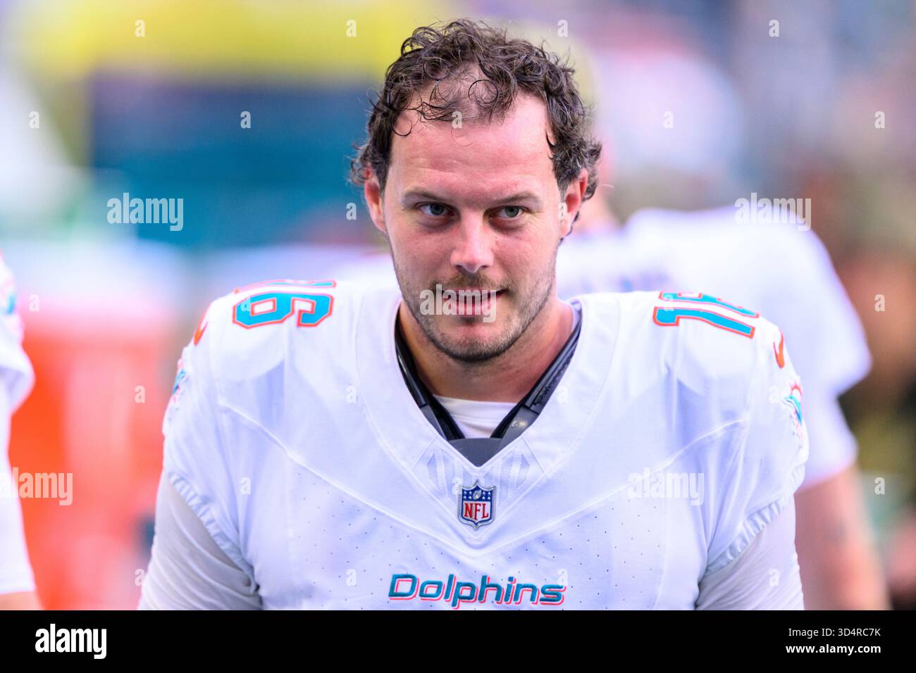 Miami Dolphins punter Jake Bailey (16) stands on the sidelines during ...