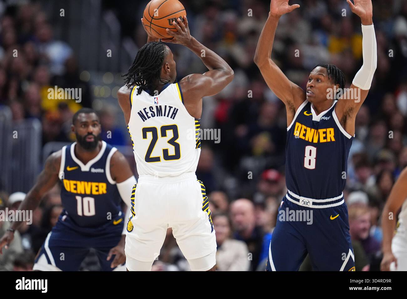 Indiana Pacers guard/forward Aaron Nesmith (23) shoots over Denver ...