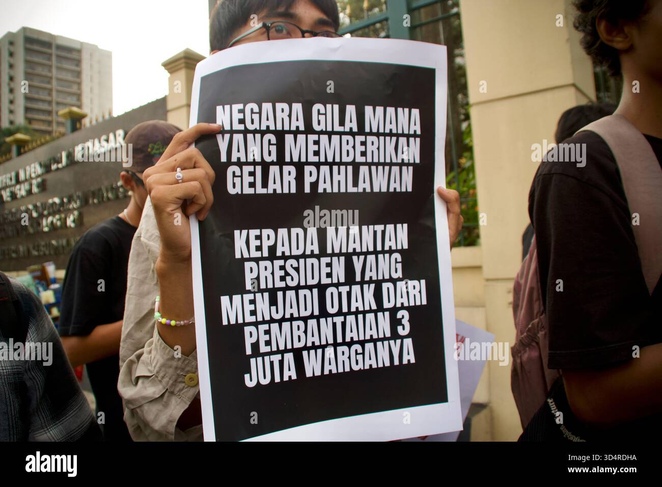 Civil society groups protest Soeharto’s national hero title in Jakarta ...