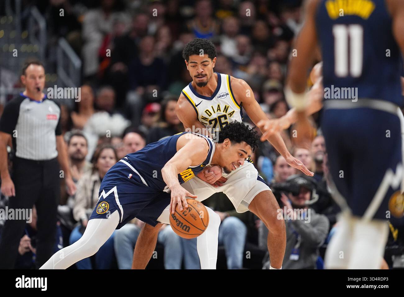 Denver Nuggets guard Julian Strawther (3) and Indiana Pacers guard Ben ...