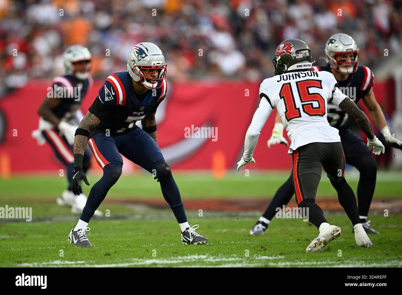 New England Patriots cornerback Carlton Davis III, left, defends ...