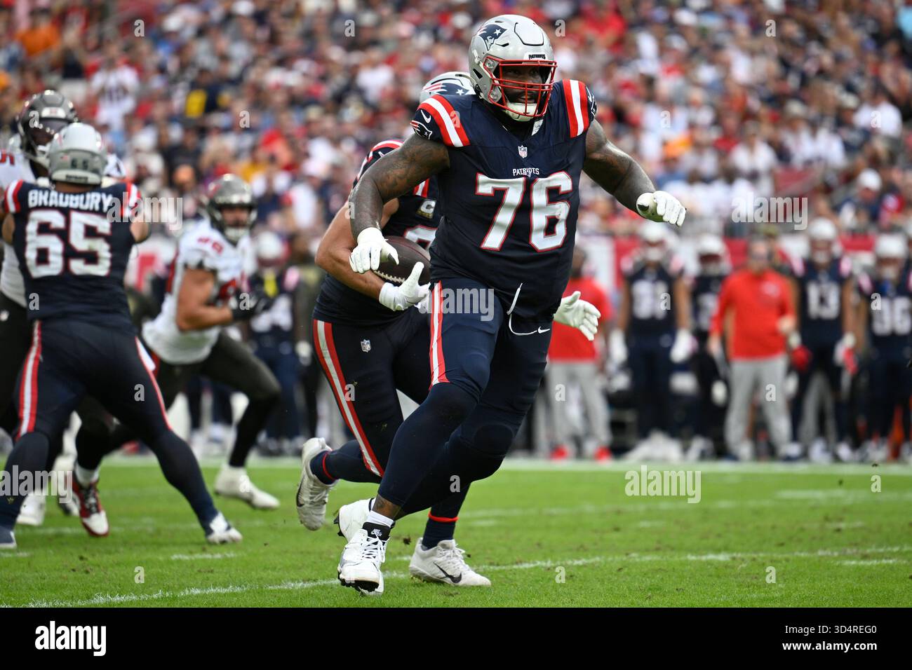 New England Patriots offensive tackle Morgan Moses (76) sets up to ...