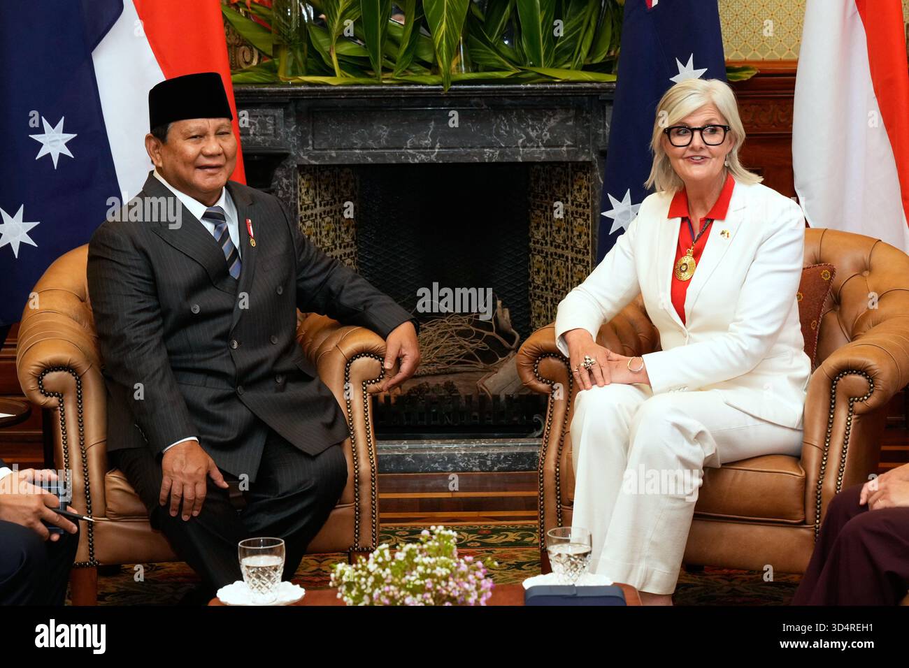 Indonesia's President Prabowo Subianto, left, sits with Australia's ...