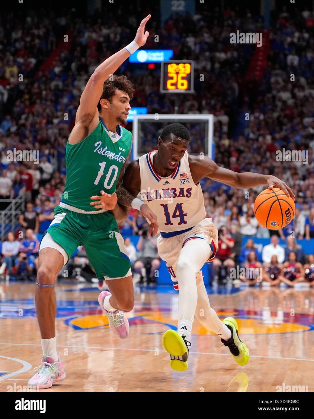 Kansas guard Melvin Council Jr. (14) drives past Texas A&M Corpus ...