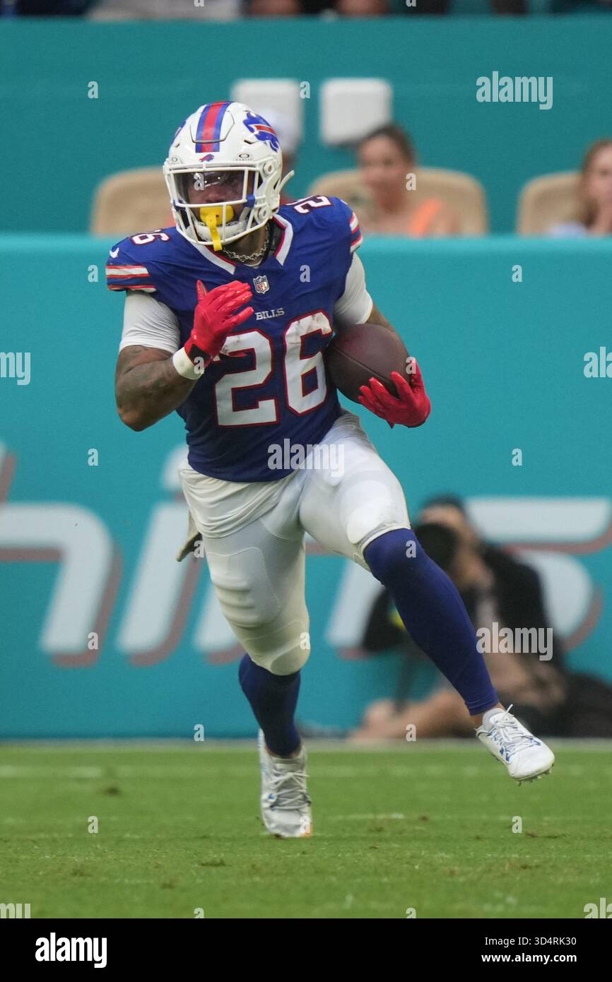 Buffalo Bills running back Ty Johnson (26) runs after a catch during an ...