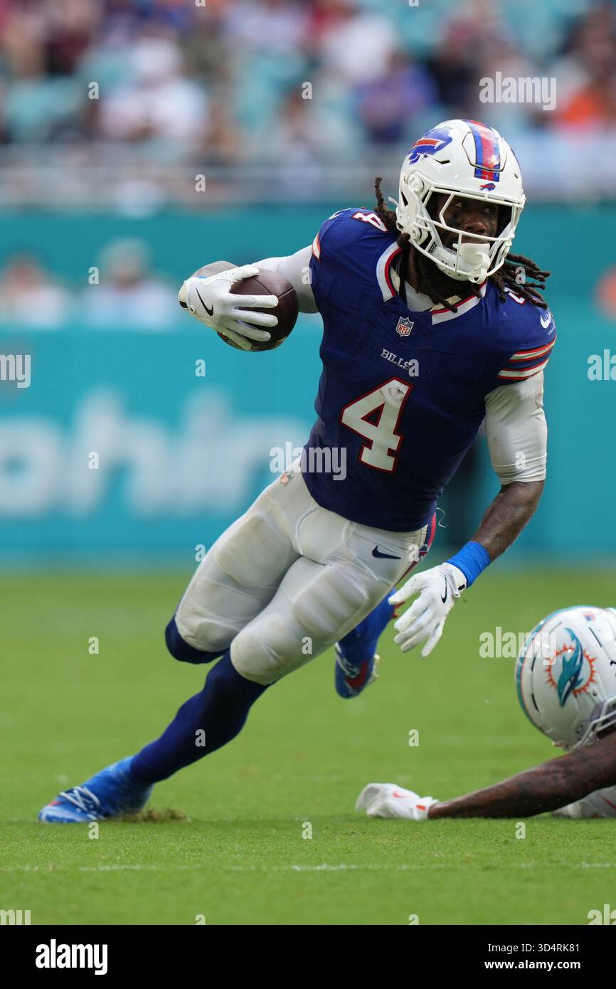 Buffalo Bills running back James Cook (4) rushes with the ball during ...