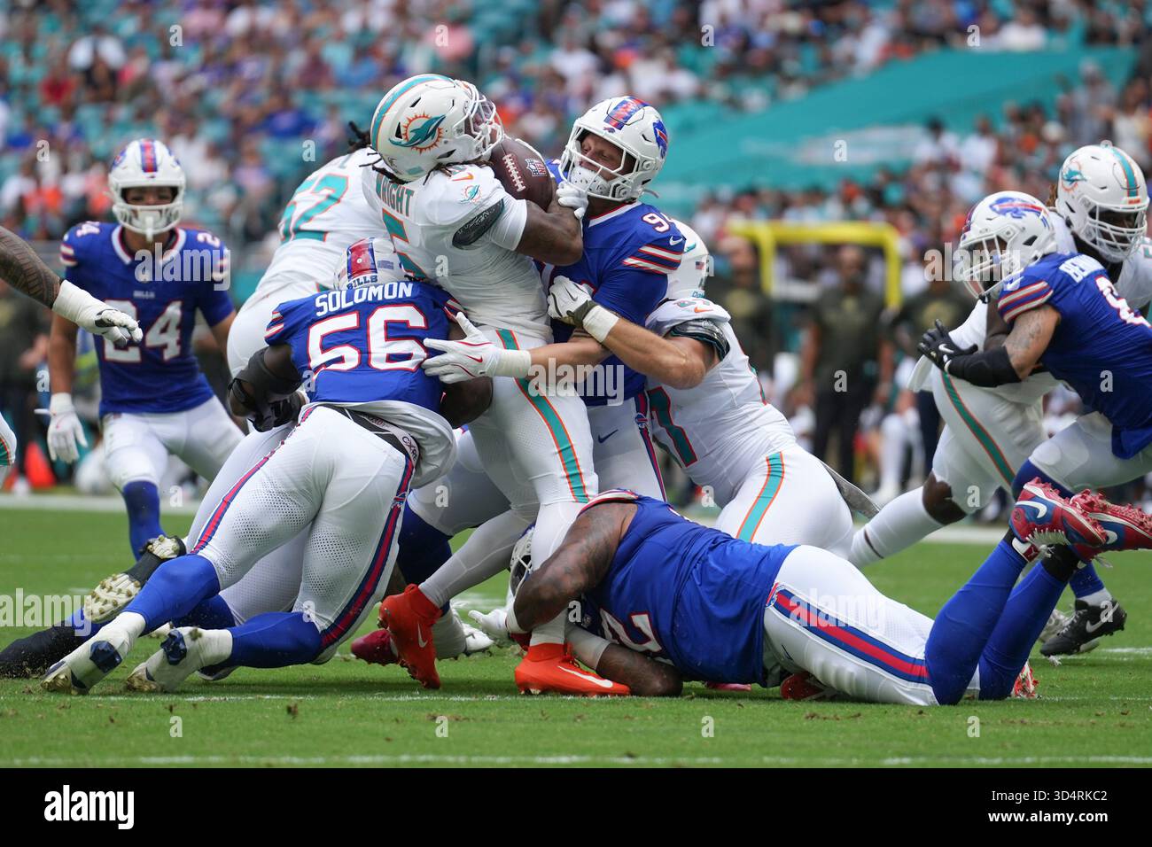 Miami Dolphins running back Jaylen Wright (5) gets stopped byBuffalo ...