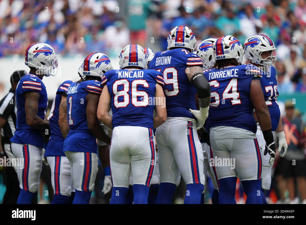 The Buffalo Bills offense huddles for a play during an NFL football ...