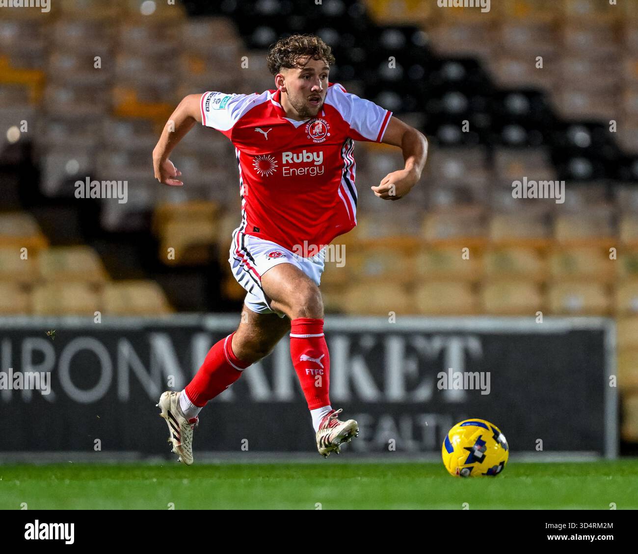 George Morrison of Fleetwood Town during the The Vertu Trophy Group G ...