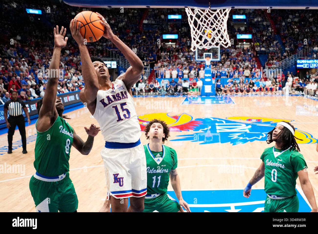 Kansas forward Bryson Tiller (15) gets past Texas A&M Corpus Christi ...