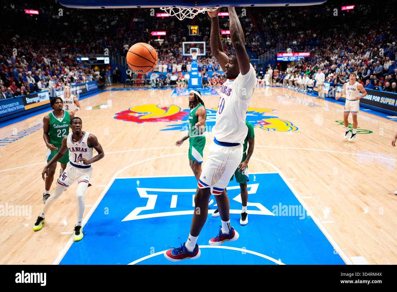 Kansas forward Flory Bidunga (40) dunks the ball during the second half ...