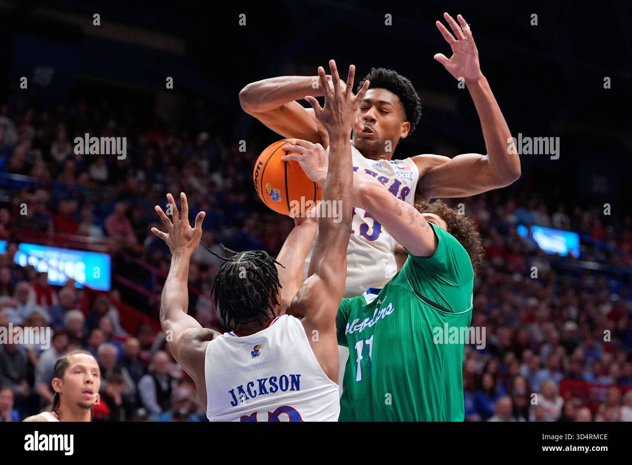 Kansas forward Bryson Tiller, top, strips the ball away from Texas A&M Corpus Christi forward ...