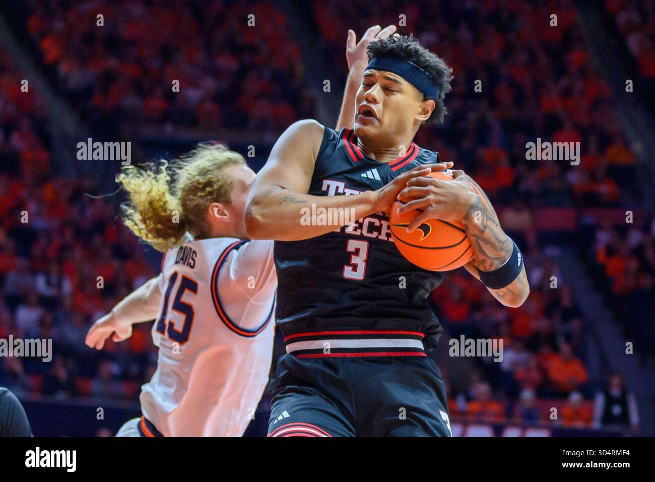 Texas Tech's LeJuan Watts grabs a rebound from Jake Davis during the ...