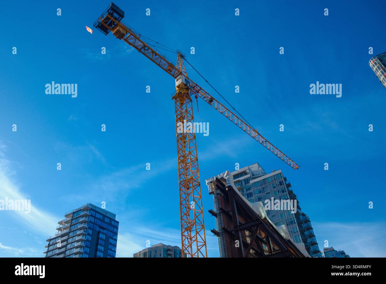A crane on a new condominium project in downtown Vancouver, BC Stock ...