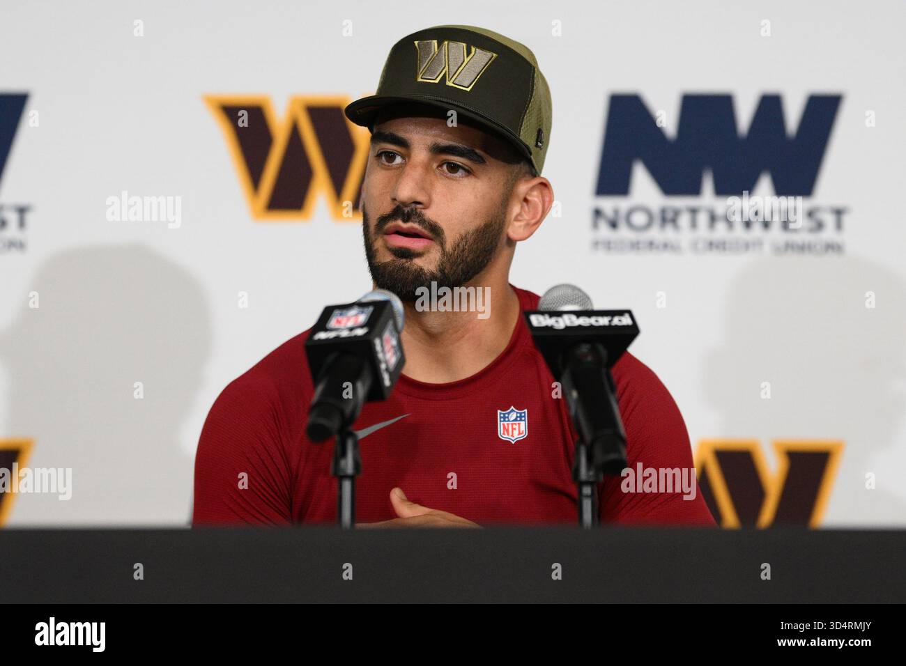 Washington Commanders quarterback Marcus Mariota speaks during a news ...