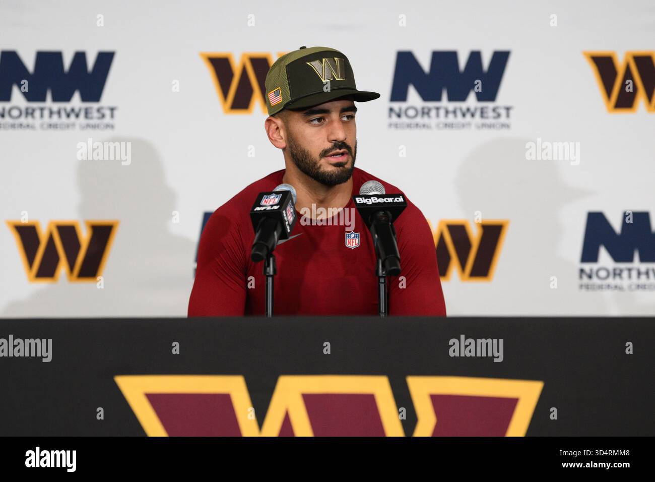Washington Commanders quarterback Marcus Mariota speaks during a news ...