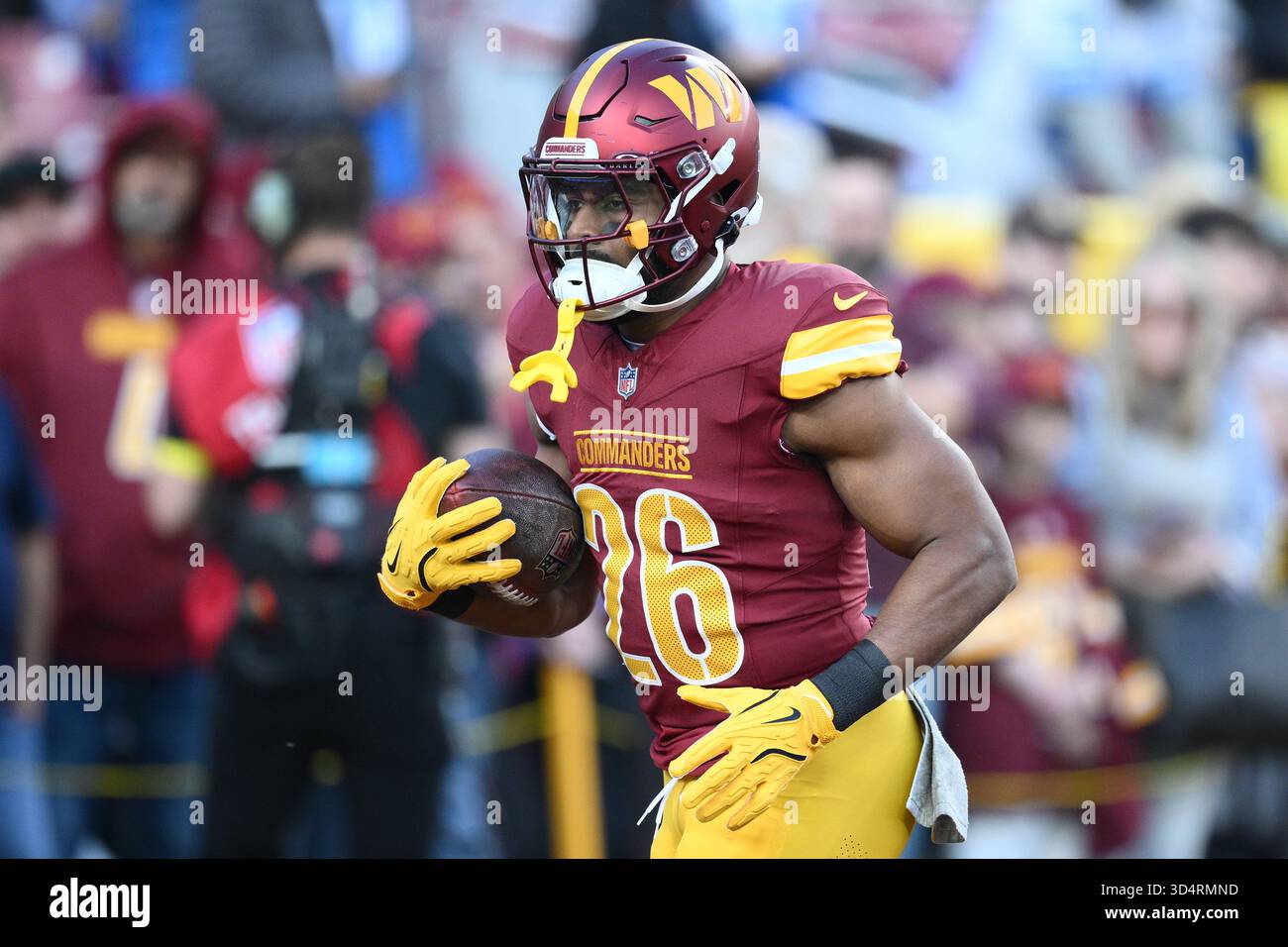 Washington Commanders running back Jeremy McNichols (26) warms up ...