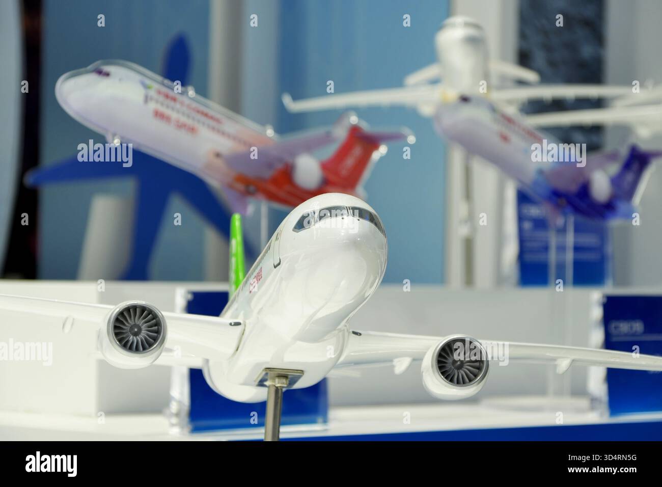 Multiple aircraft models exhibited at the COMAC booth at the 8th CIIE ...