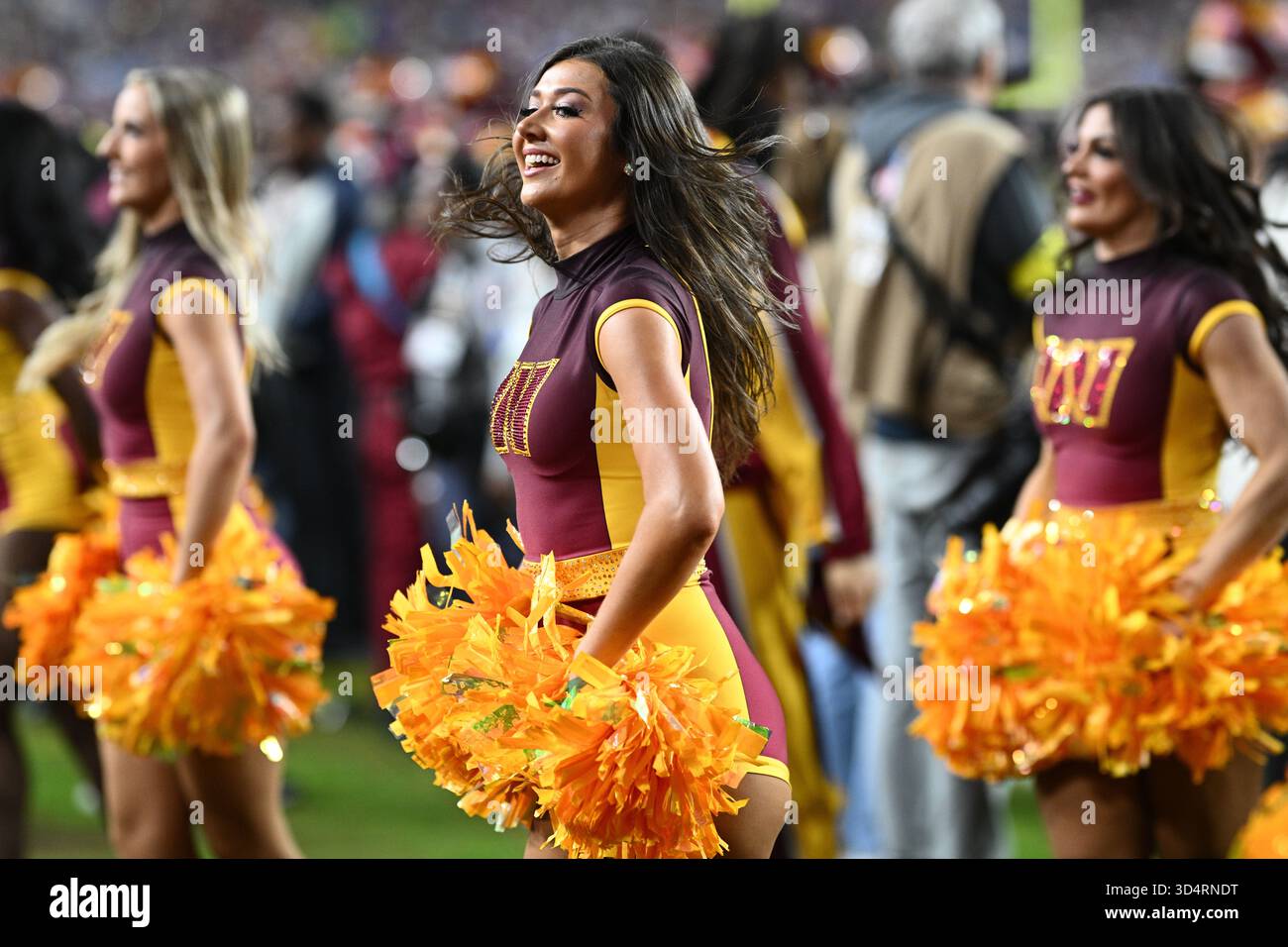 The Command Force performs during an NFL football game between the ...