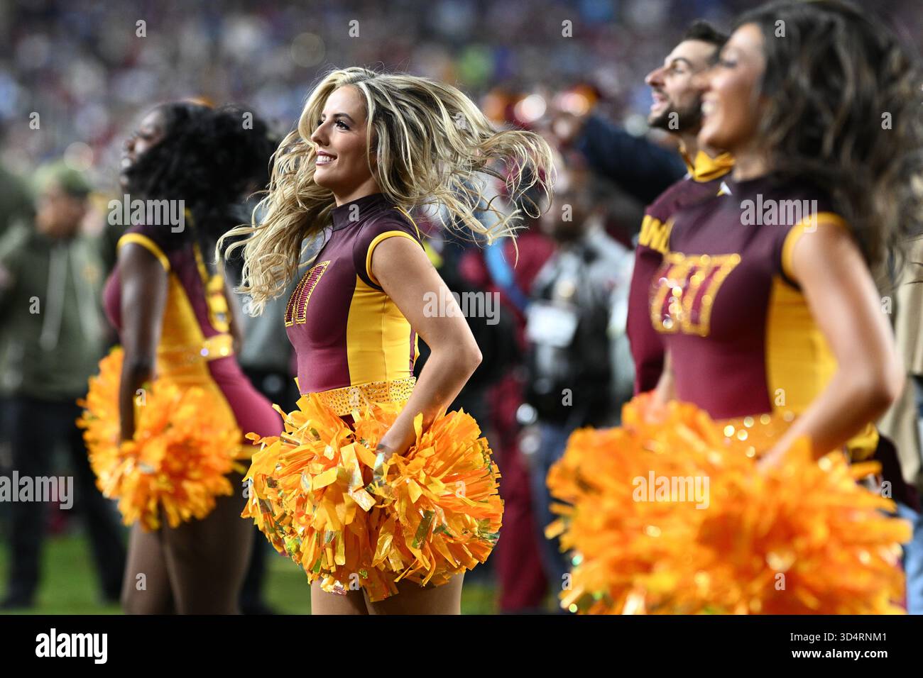 The Command Force performs during an NFL football game between the ...