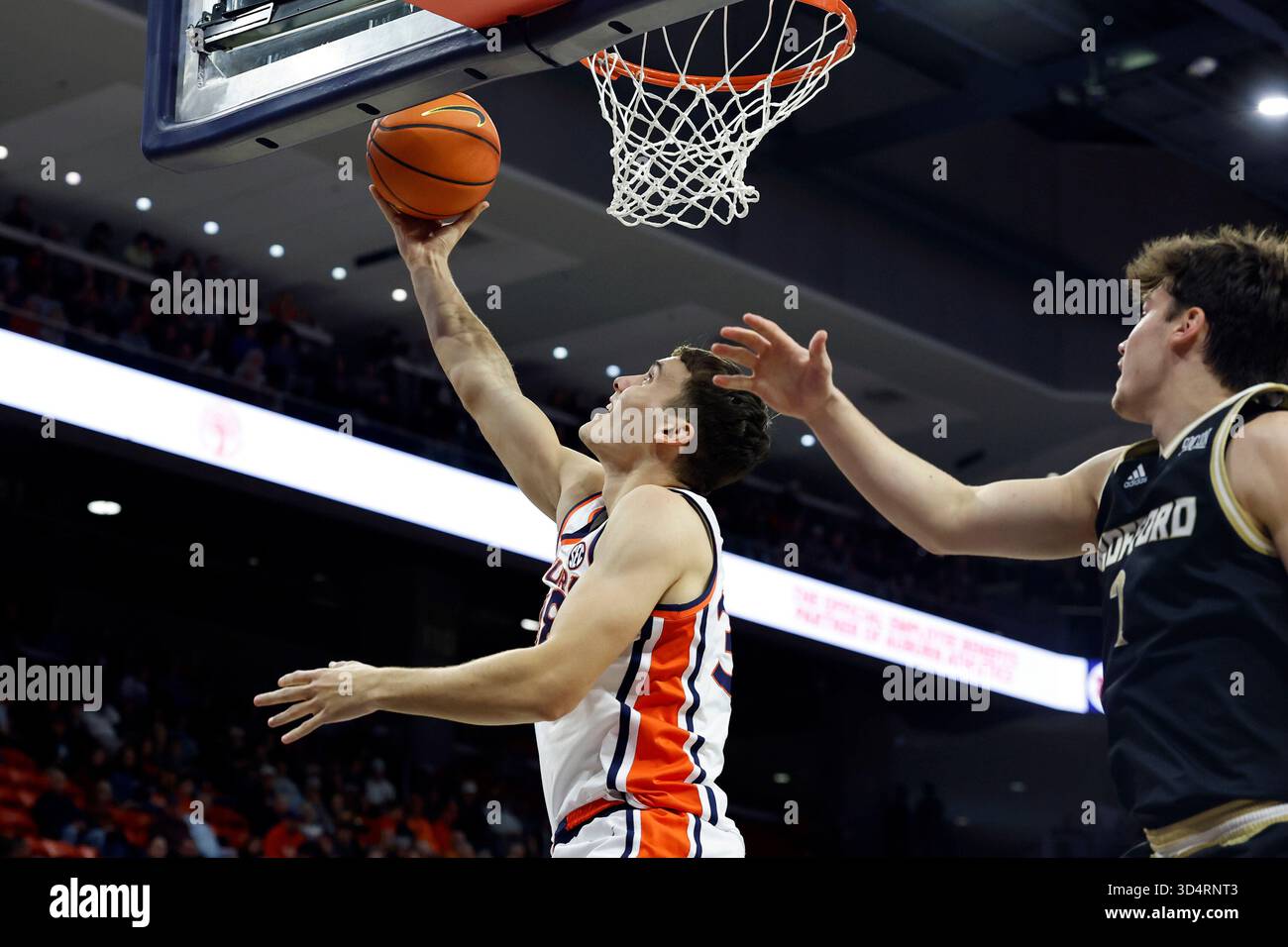 Auburn forward Filip Jovic (38) lays in a basket as Wofford forward ...