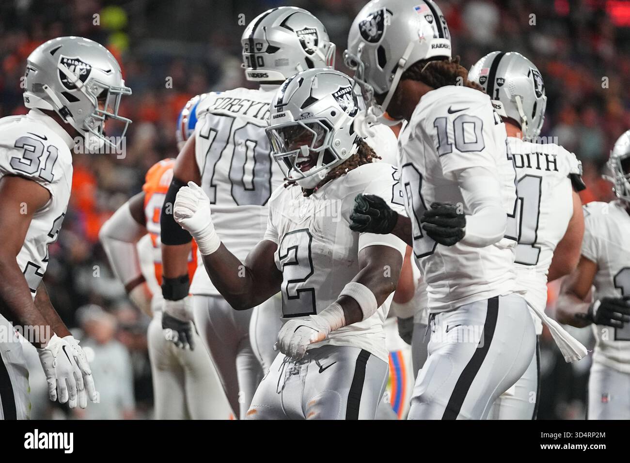Las Vegas Raiders running back Ashton Jeanty (2) celebrates a touchdown ...