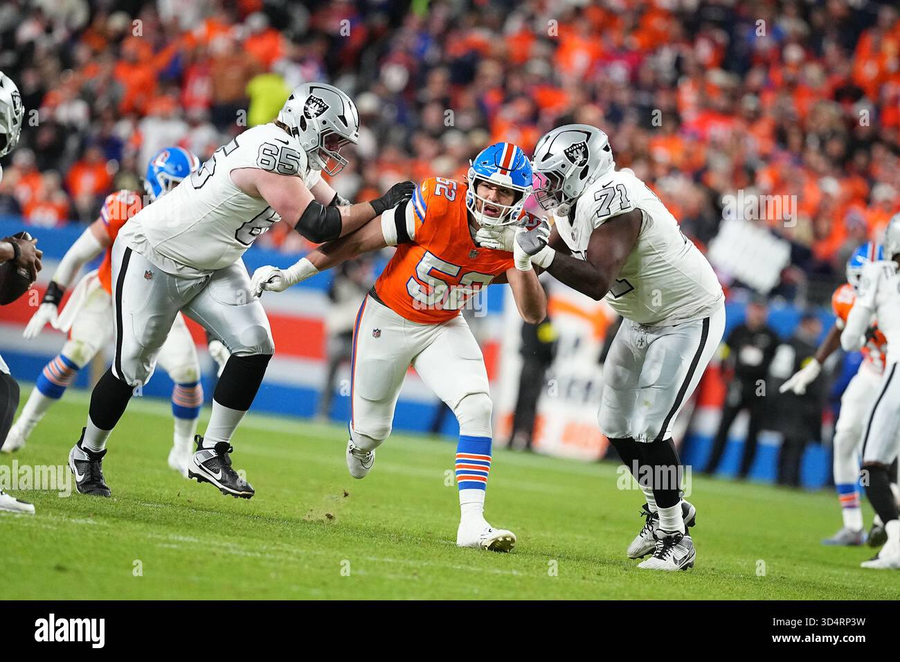 Denver Broncos linebacker Jonah Elliss (52) rushes the quarterback ...