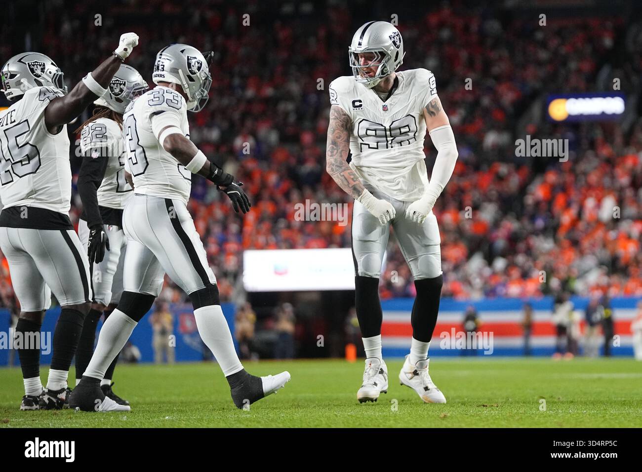Las Vegas Raiders defensive end Maxx Crosby (98) celebrates a play ...