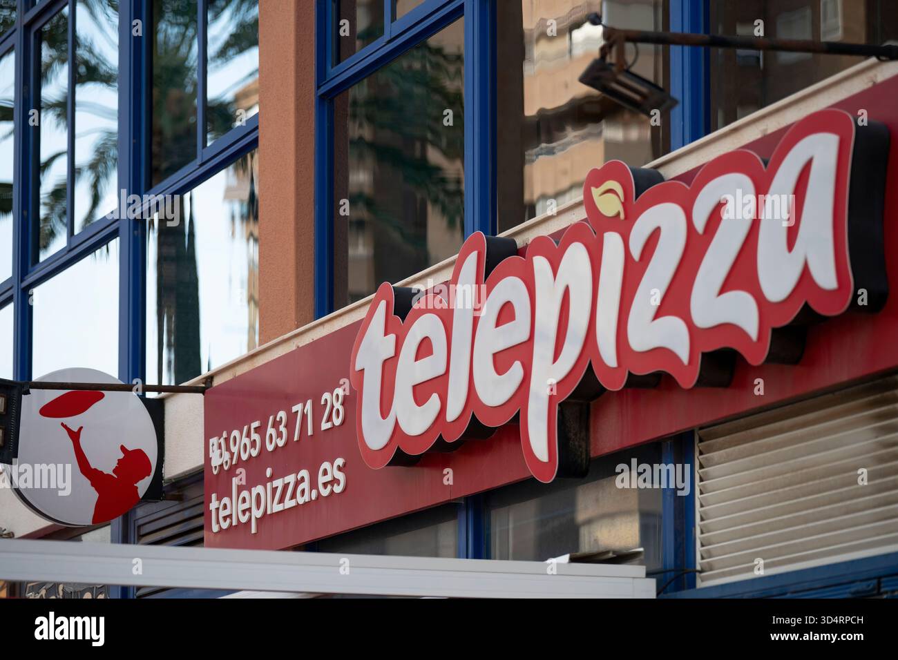 Spanish fast-food restaurant branch of Telepizza and logo seen in ...