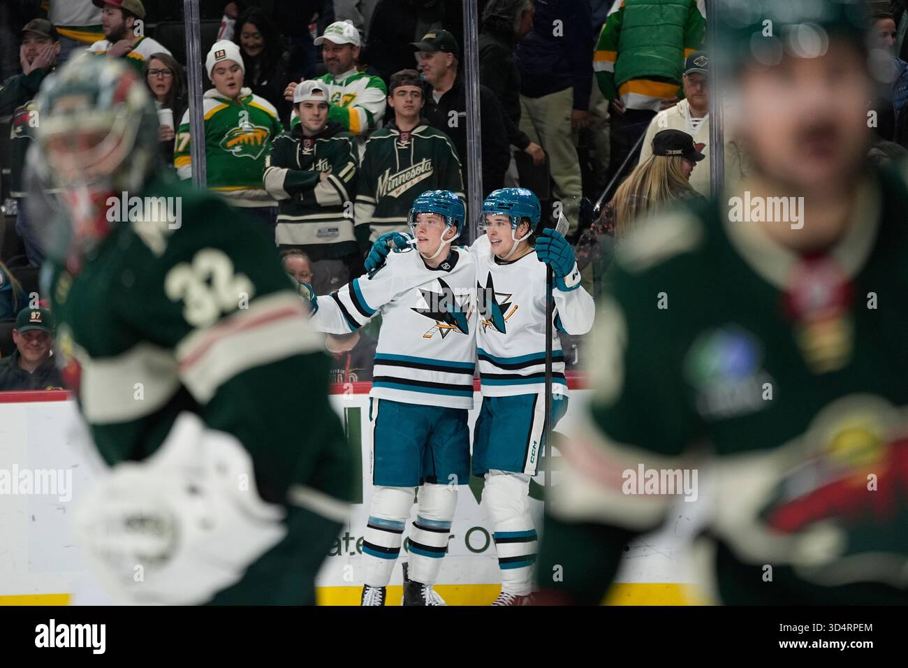 San Jose Sharks right wing Collin Graf, center left, celebrates with ...