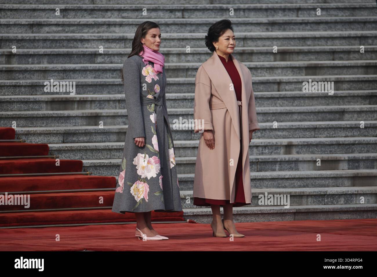 Spain's Queen Letizia, left, and Chinese First Lady Peng Liyuan, right ...