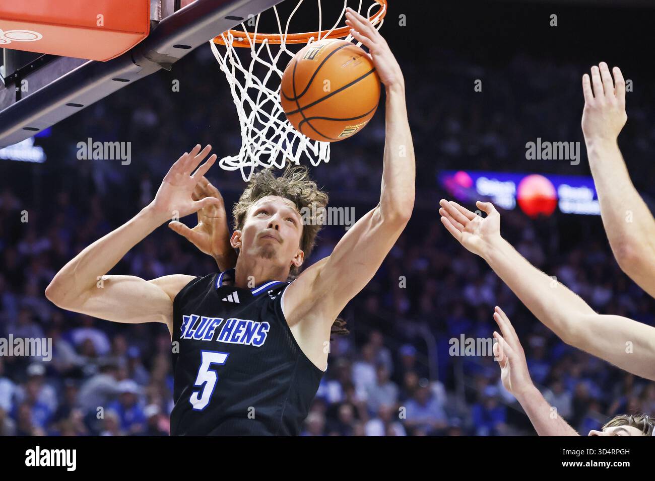Delaware forward Macon Emory grabs a rebound over BYU during the first ...