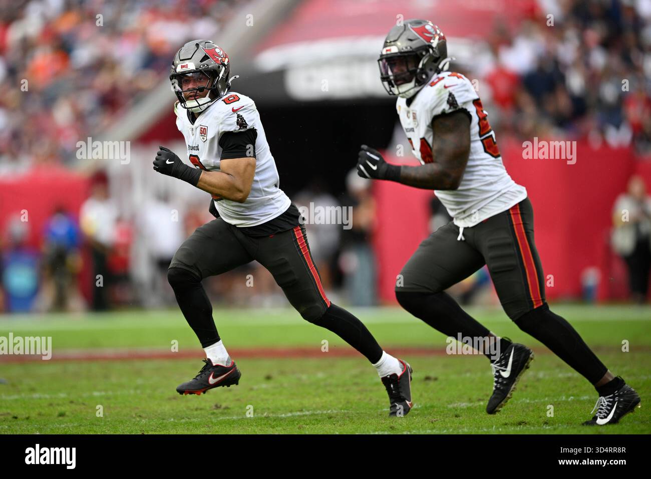 Tampa Bay Buccaneers linebacker SirVocea Dennis (8) and linebacker ...
