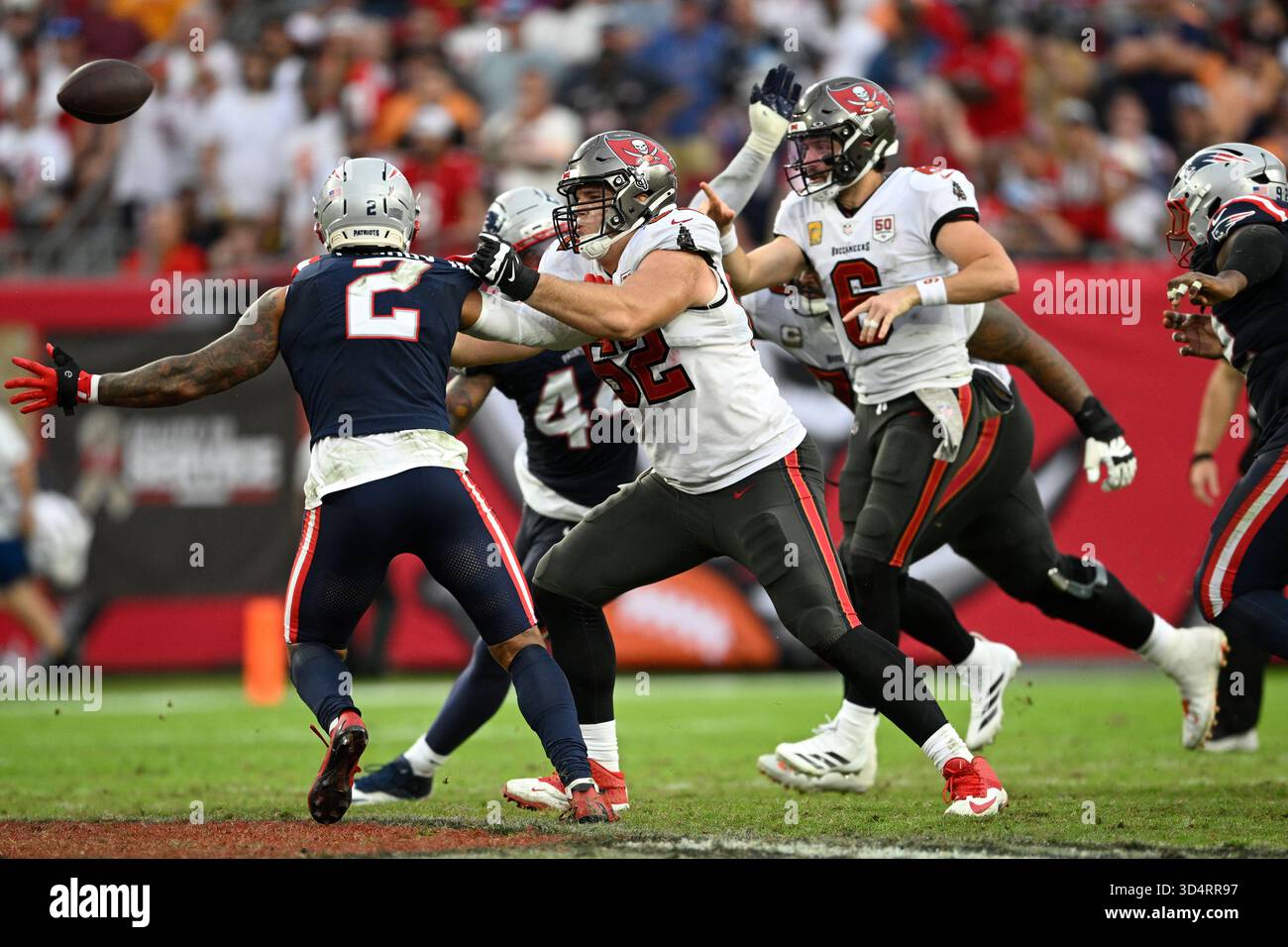 Tampa Bay Buccaneers center Graham Barton (62) blocks New England ...