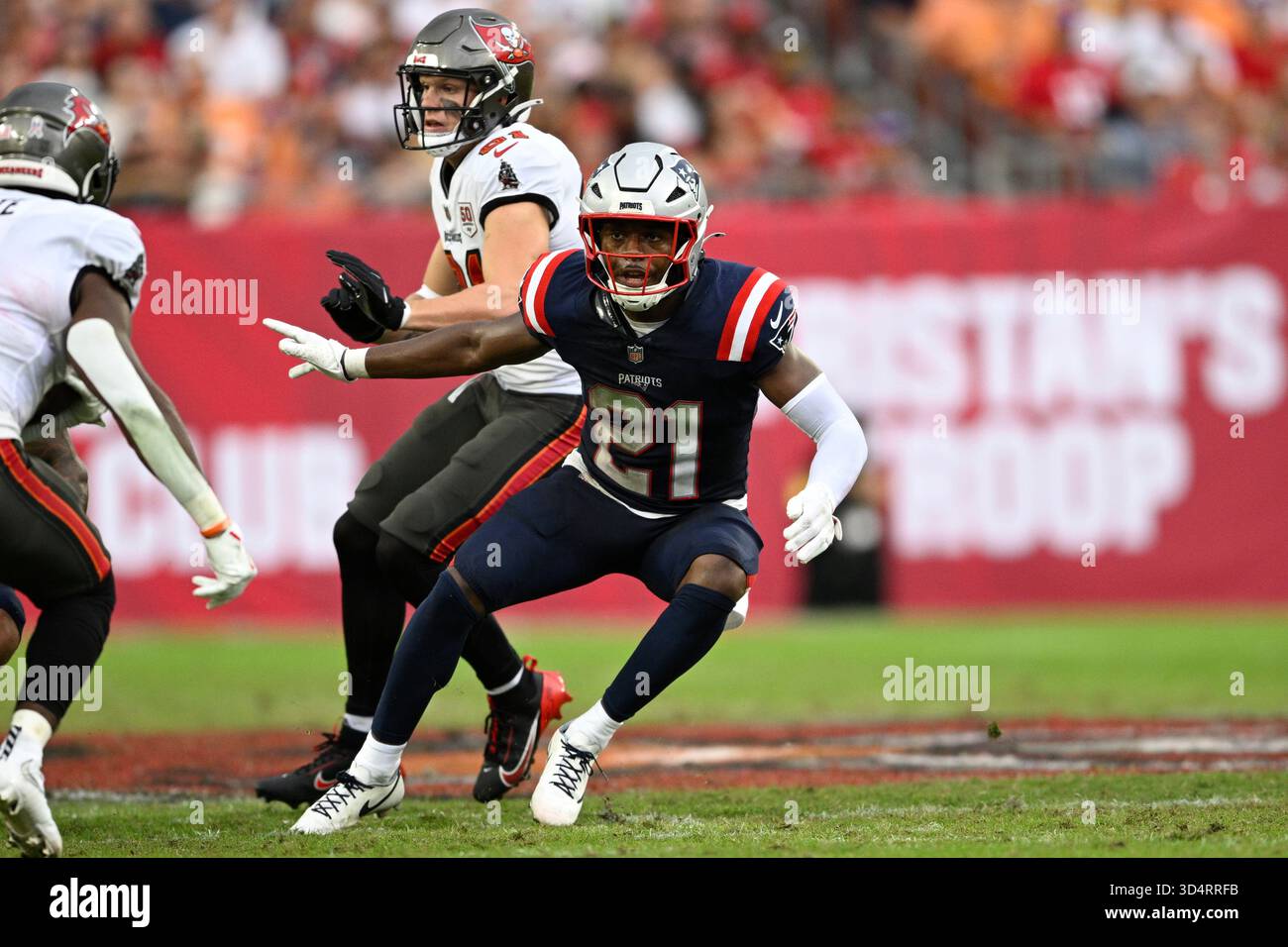 New England Patriots safety Jaylinn Hawkins (21) follows a play against ...